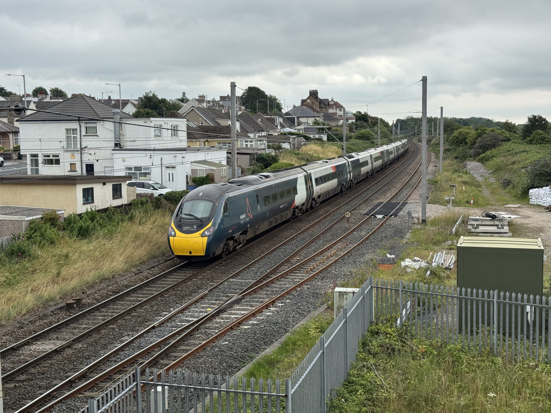 Photo of 390042 at Hest Bank Level Crossing — trainlogger